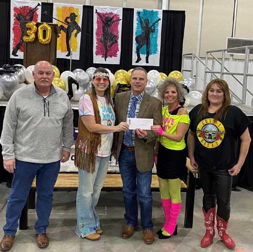 McCraw Oil and TXB give to the Children's Center - North Texas e-News